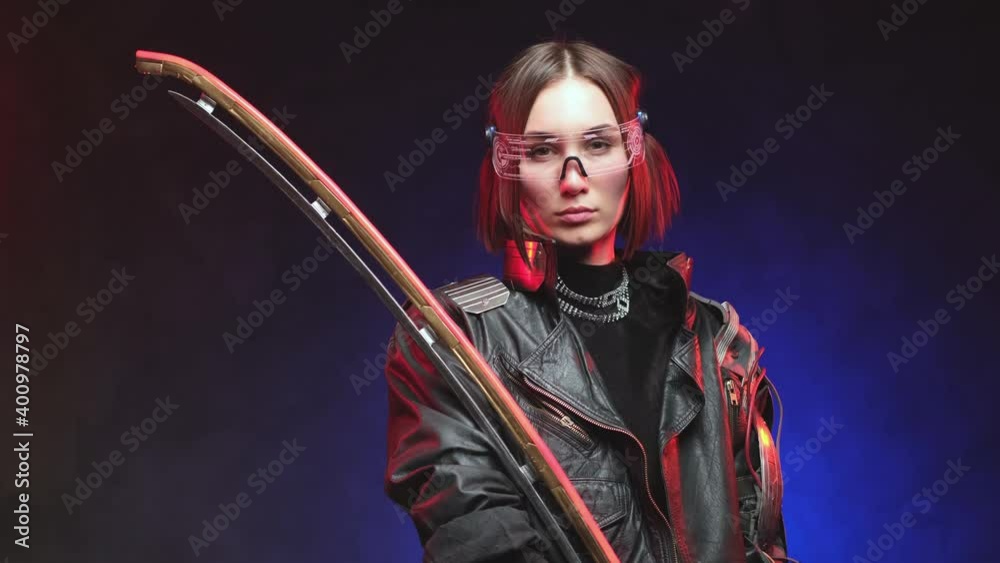 Dangerous female assassin from the future in cyberpunk style armed with ...