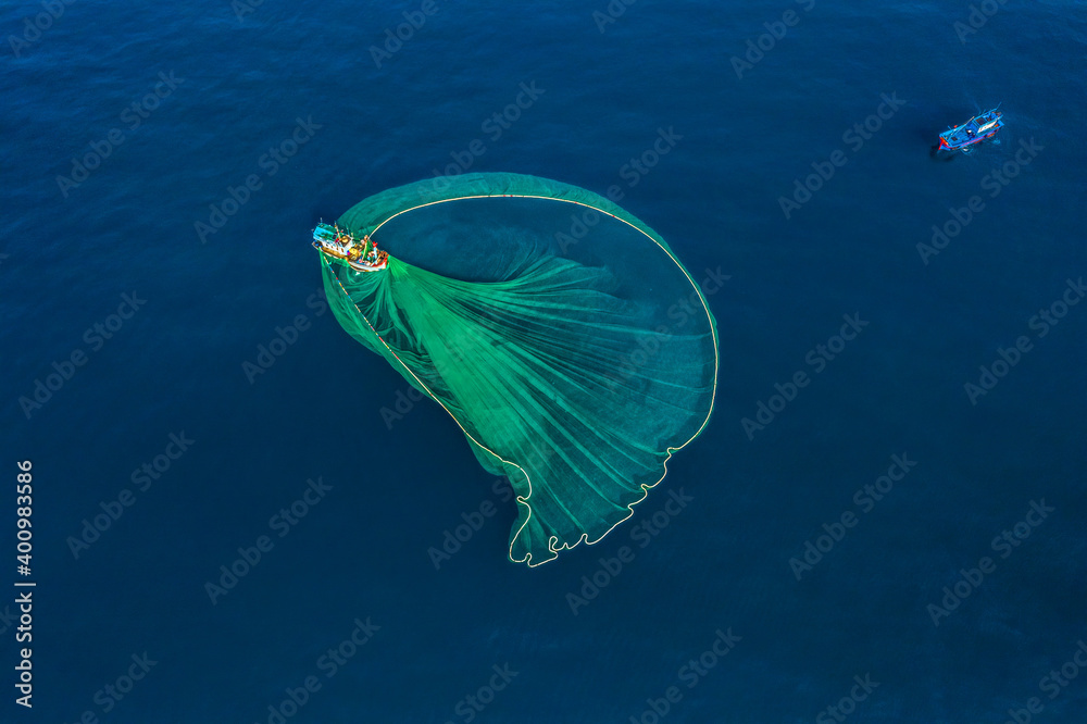 Ships and fishermen are fishing anchovies in Yen Island, Phu Yen ...
