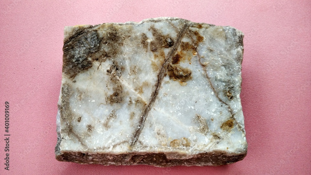 Marble stone metamorphism of calcite from limestone. On apink ...