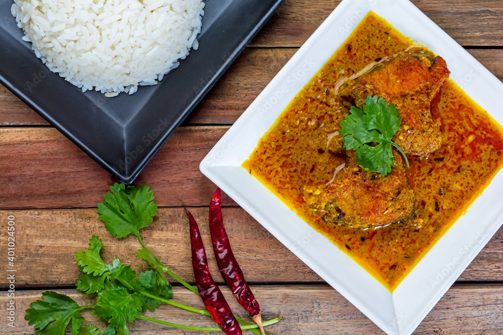 Bengali cuisine - doi katla (catla fish curry with yogurt) in a plate ...