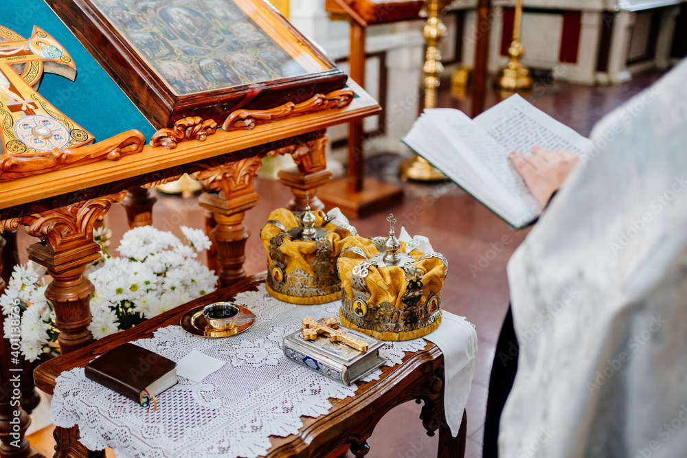 priest is standing near Lectern.high table with sloping top for ...