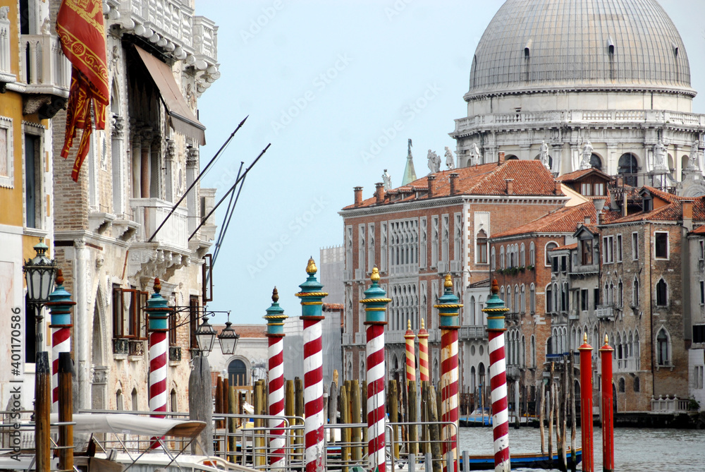 The Canal Grande of Venice is animated by gondolas, boats, ferries and ...