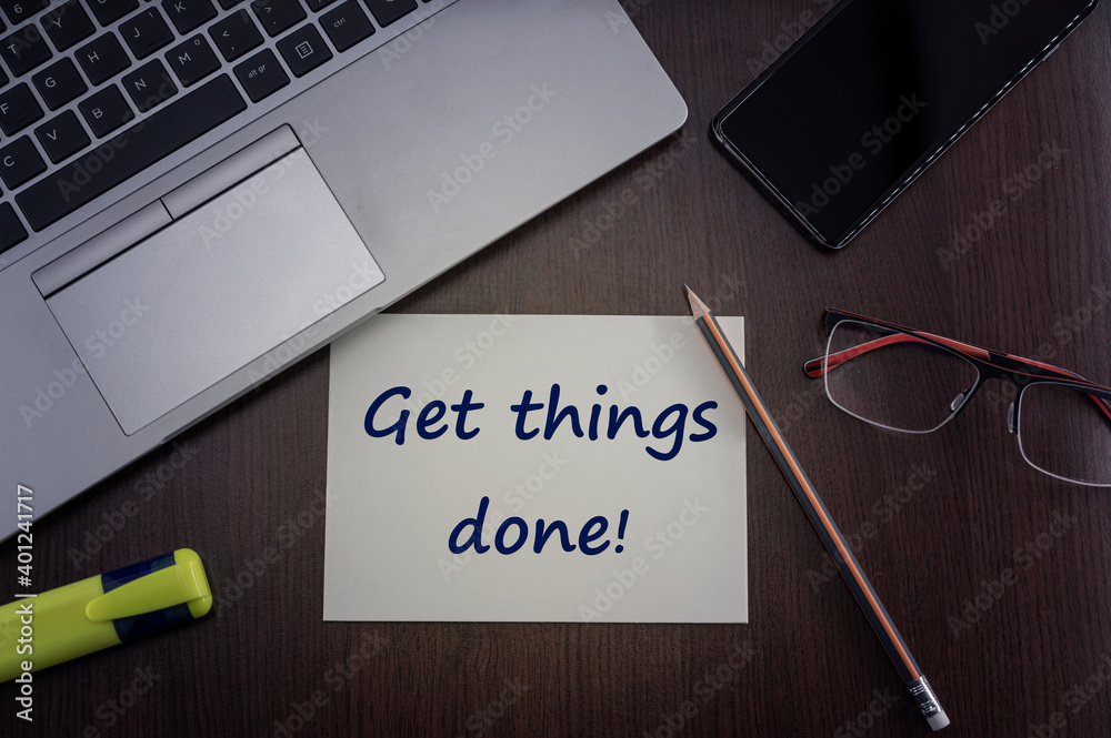 Get things done card. Top view of office table desktop background with ...
