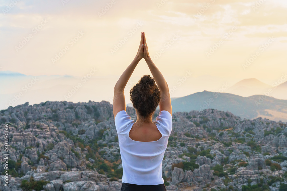 Full body back view of unrecognizable barefoot female standing in Star ...