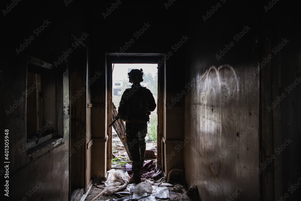 Military men with arms defending the building. Soldier stand guard ...