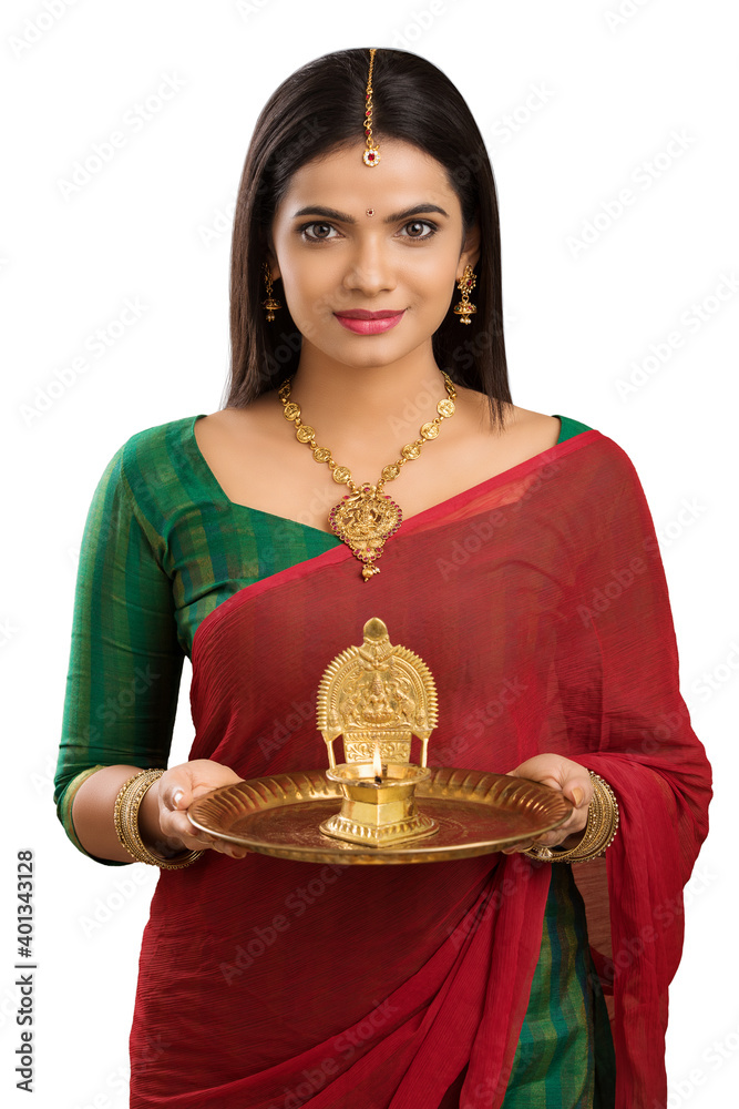 Hindu Indian young women holding Deepam in hands. ( Kamatchi vilakku ...