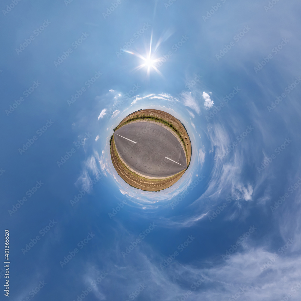 tiny planet in blue sky with sun and beautiful clouds. Transformation ...