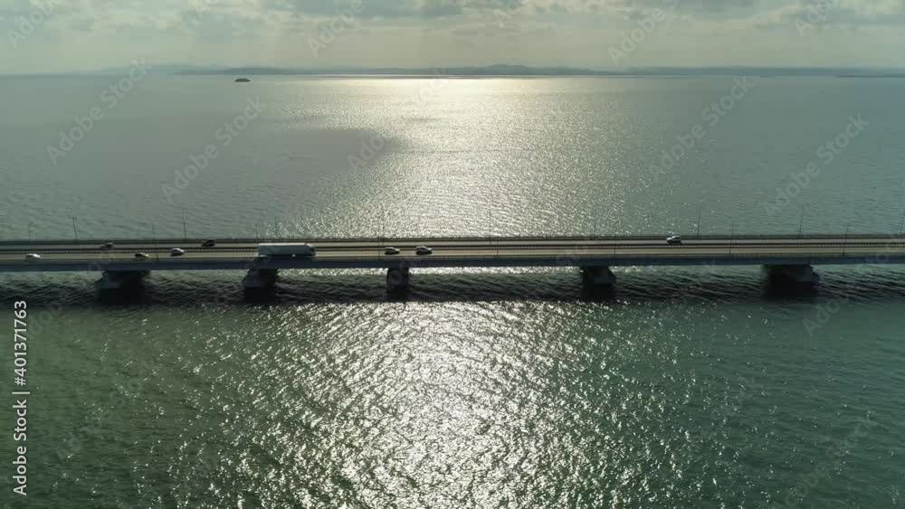 Drone sideways low-water bridge across blue sea bay Vladivostok Russia ...