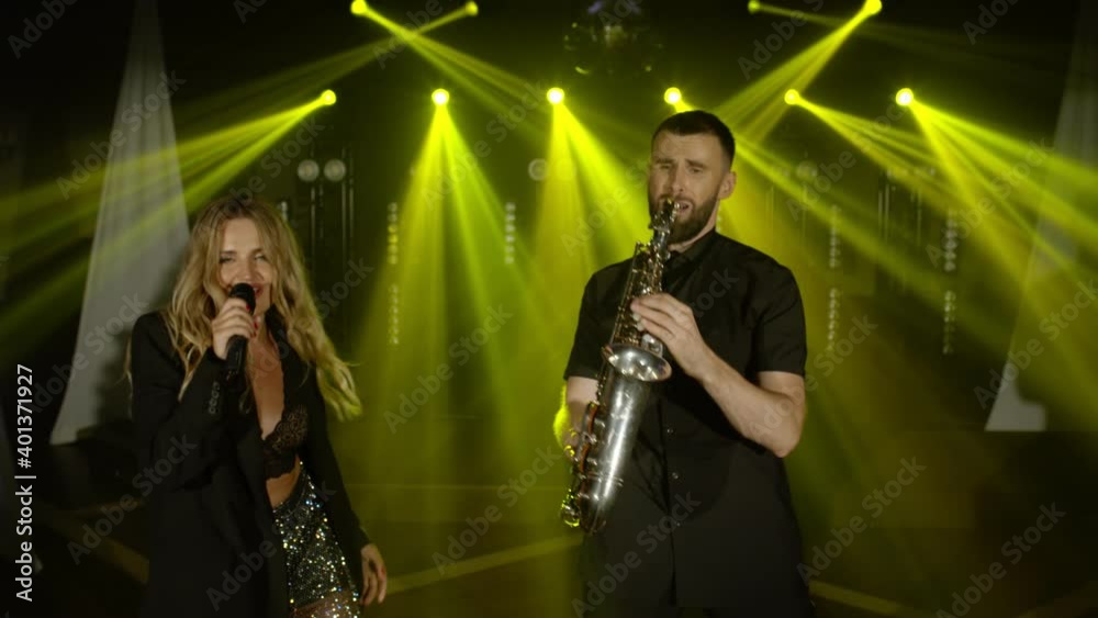 Musical band group of two people playing song, performing on concert ...