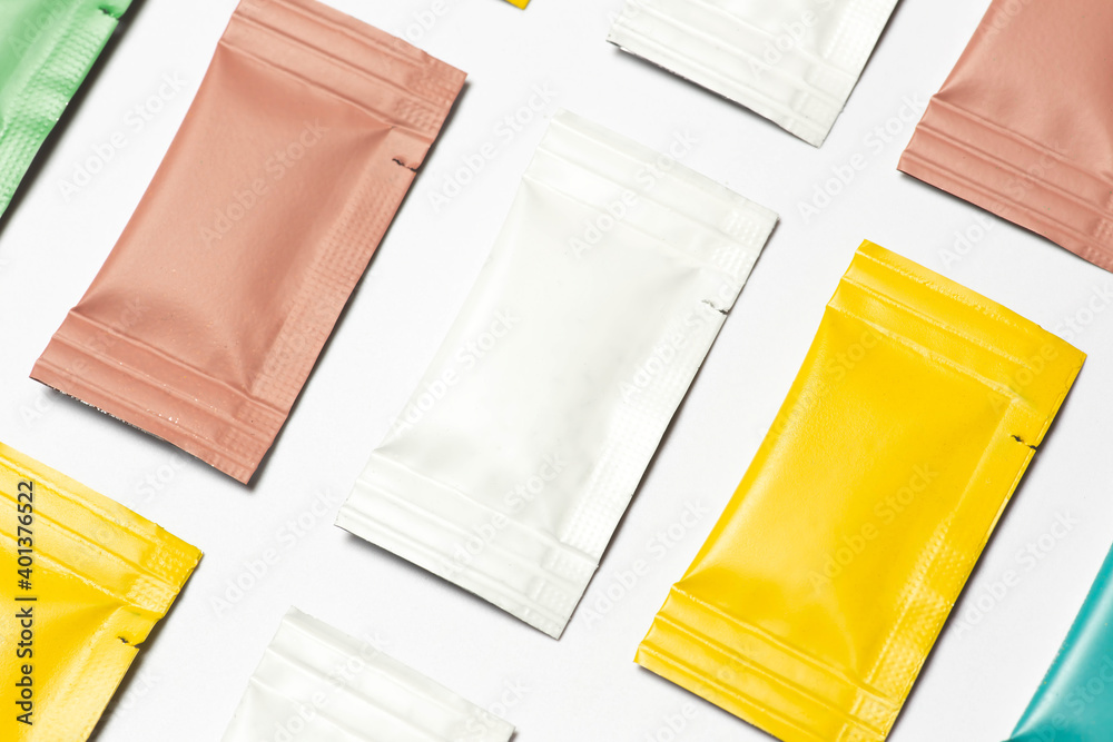 Close-up composition of colored sachets on a white background. Stock ...