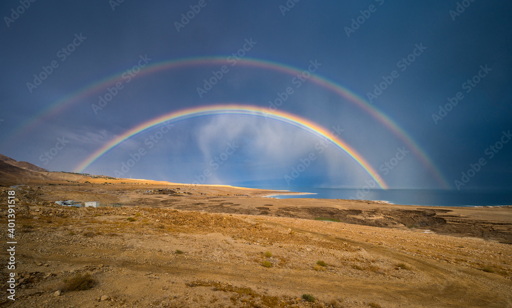Foto de Beautiful Israeli landscape: rainbow in the clouds over the ...