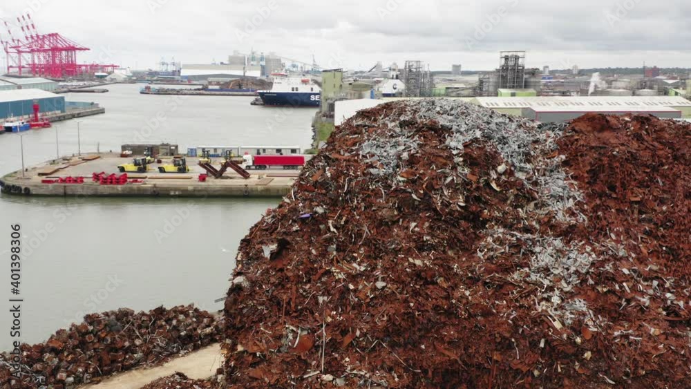 Large pile of scrape steel located on a dock yard in the UK. Industrial ...