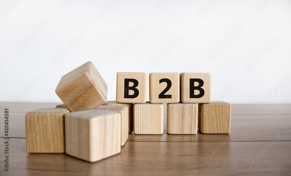 B2B symbol. Concept word 'B2B - business to business' on cubes on a ...