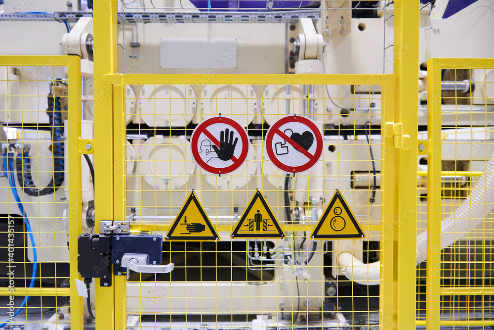 warning signs in a factory Stock Photo | Adobe Stock