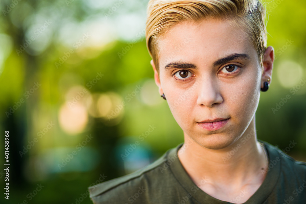 Young woman beauty Tomboy lifestyle with blonde short hair posing in ... Young woman beauty Tomboy lifestyle with blonde short hair posing in ...
