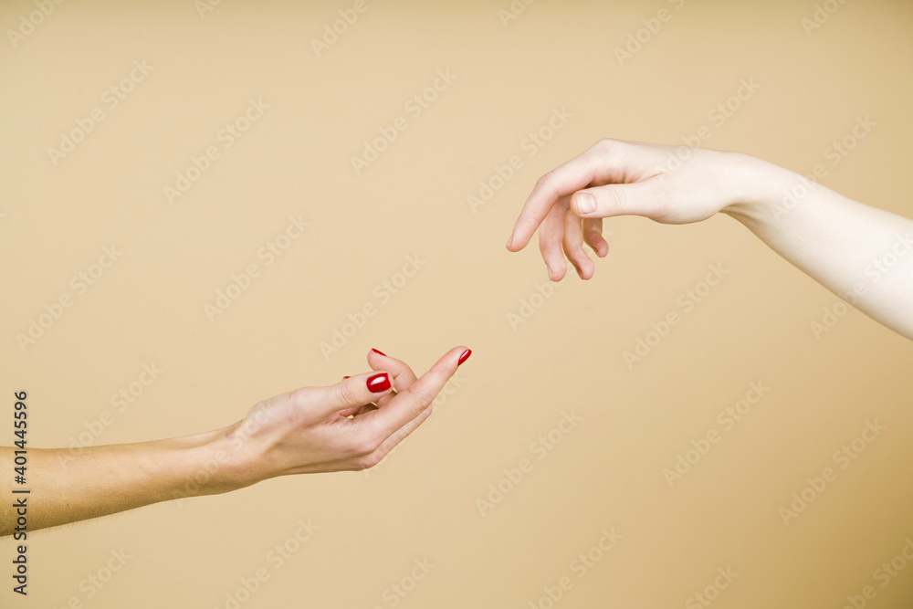 Touch. Moment of weightless. Male and female hands trying to touch like ...