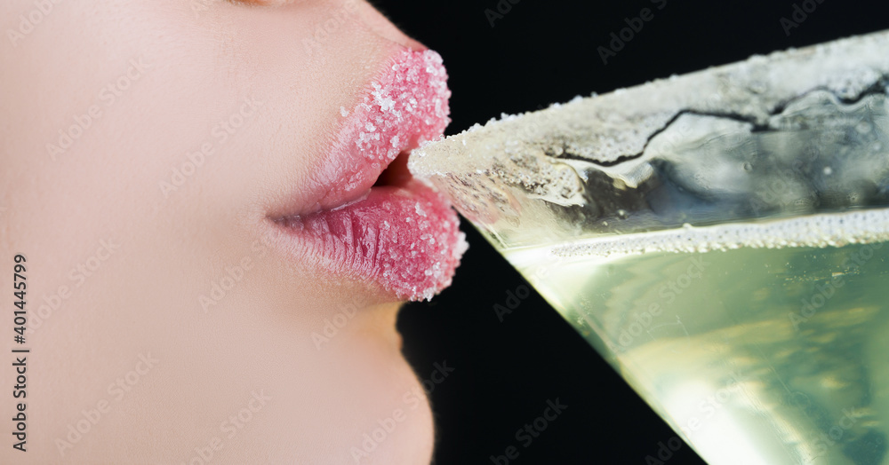 Cocktail party. Sugar lips with martini cocktail. Sexy lips lick sugar ...