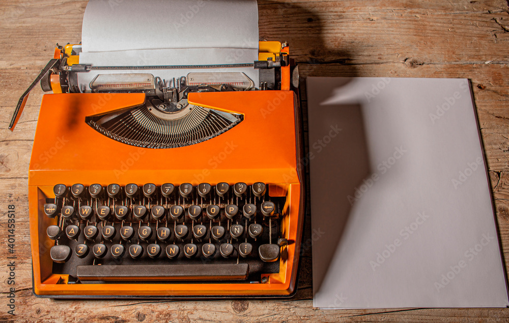 Vintage work office typewriter above rustic escritory. Equipment of ...