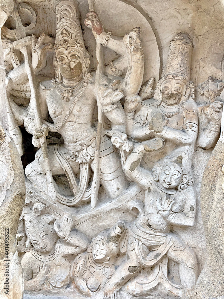 Hindu God deity statue. Ancient sandstone carved historical Hindu God ...