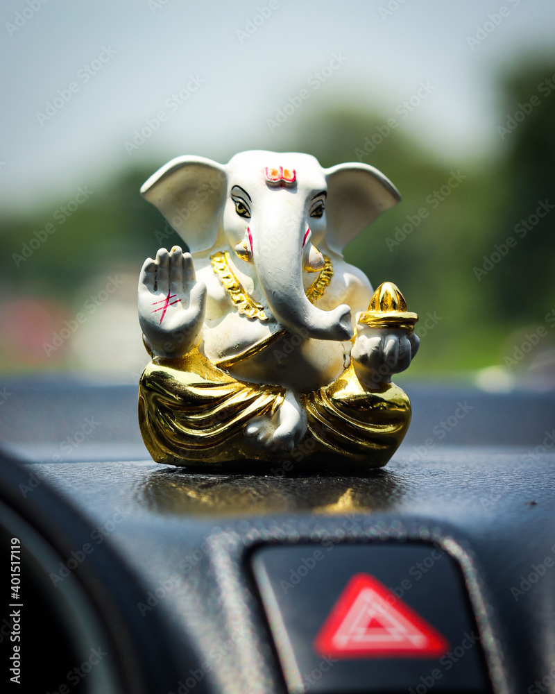 Hindu god Lord Ganpati, Ganpati click with green background in car ...