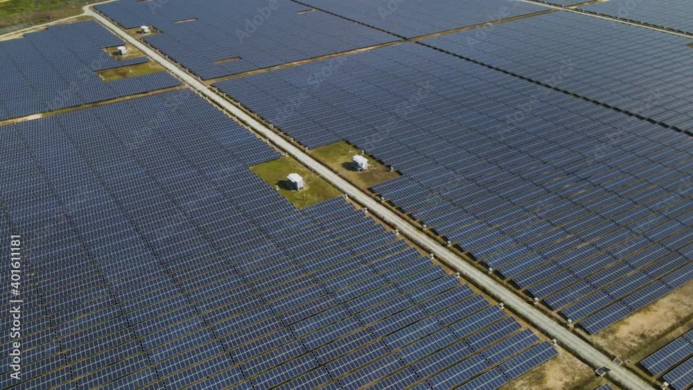 4K UHD Cinematic Footage Of Aerial view of a large scale solar panel ...