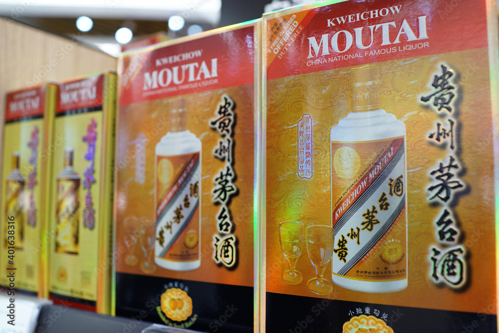 Moutai display on store shelf in Changi Airport Terminal 4. Moutai is a ...