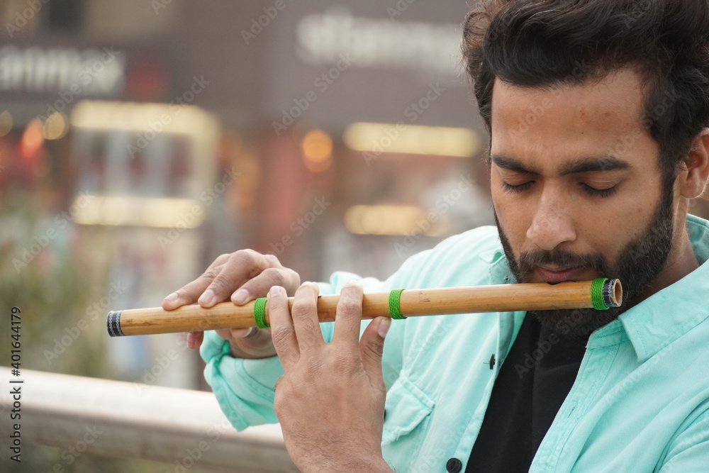 Indian man playing bansuri Indian Bamboo Flute Stock Photo | Adobe Stock