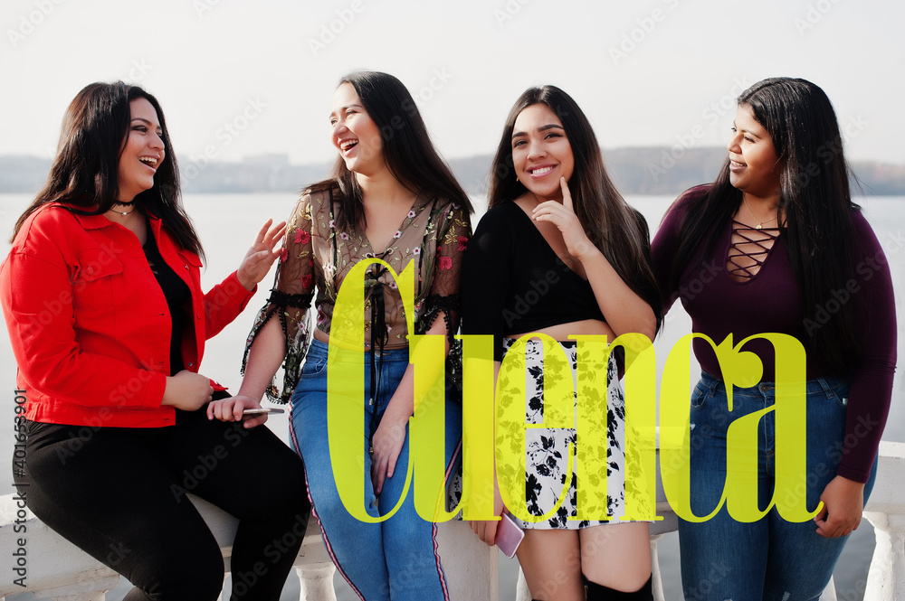 Santa Ana de los Cuatro Rios de Cuenca city. Group of four happy and ...