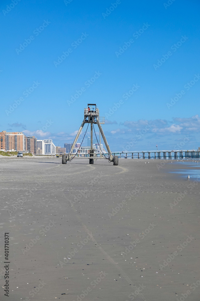 An amphibious buggy tower used for beach replenishment is seen rolling ...