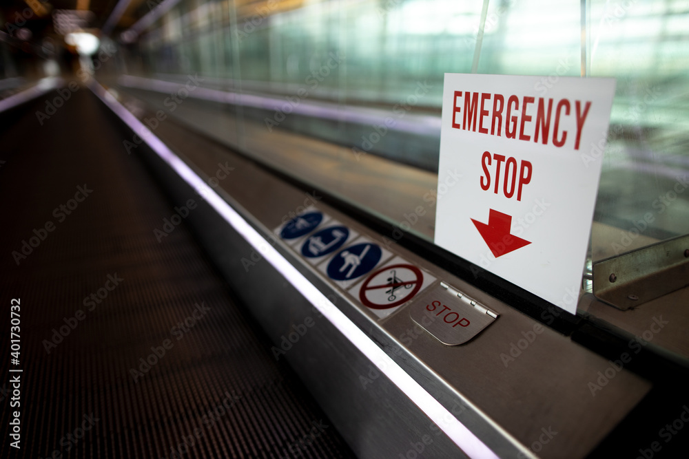 Safety switch red emergency stop on escalator warning sign, symbol ...