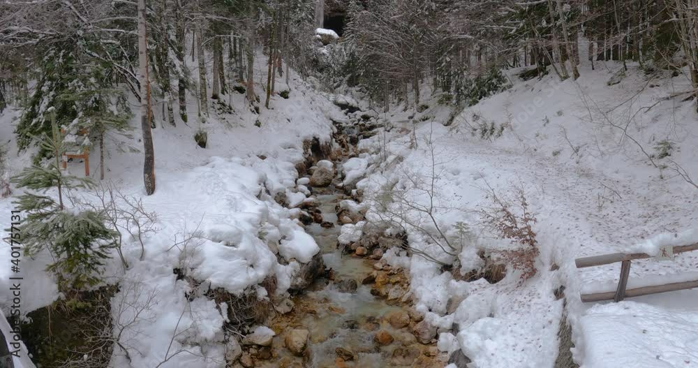 Famous waterfall Pericnik flowing over Alpine cliff. Water flowing ...