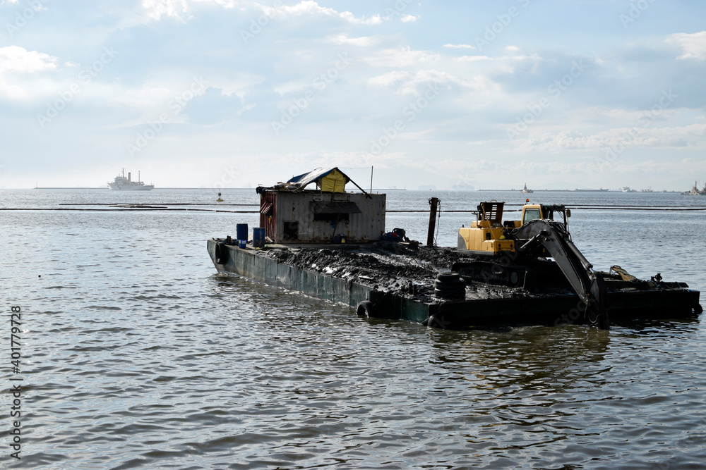 construction bulldozer crane truck working, loded on floating steel ...