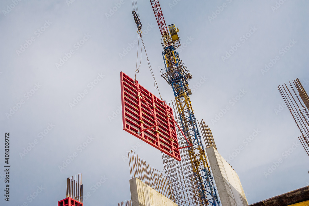 Transporting the formwork by crane. Stock Photo | Adobe Stock