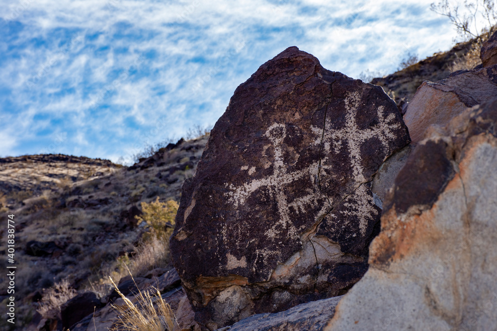 Historical petroglyphs carved on desert rocks by native indigenous ...