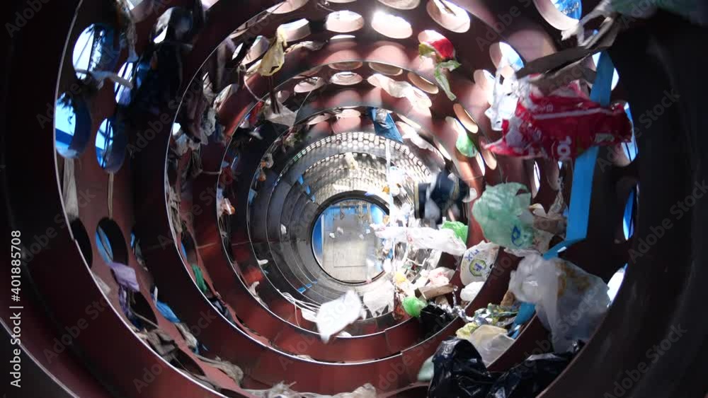 Sorting of garbage by means of rotation in the special device for ...