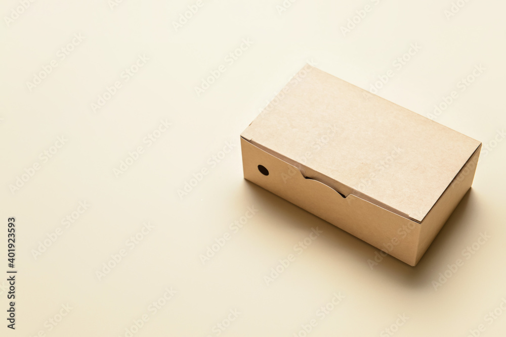Blank cardboard box on color background Stock Photo | Adobe Stock