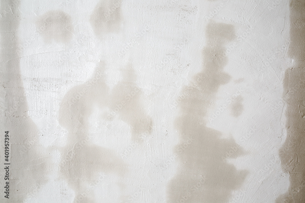 Wet and dry putty ceiling background. Drying process. Repair work of ...