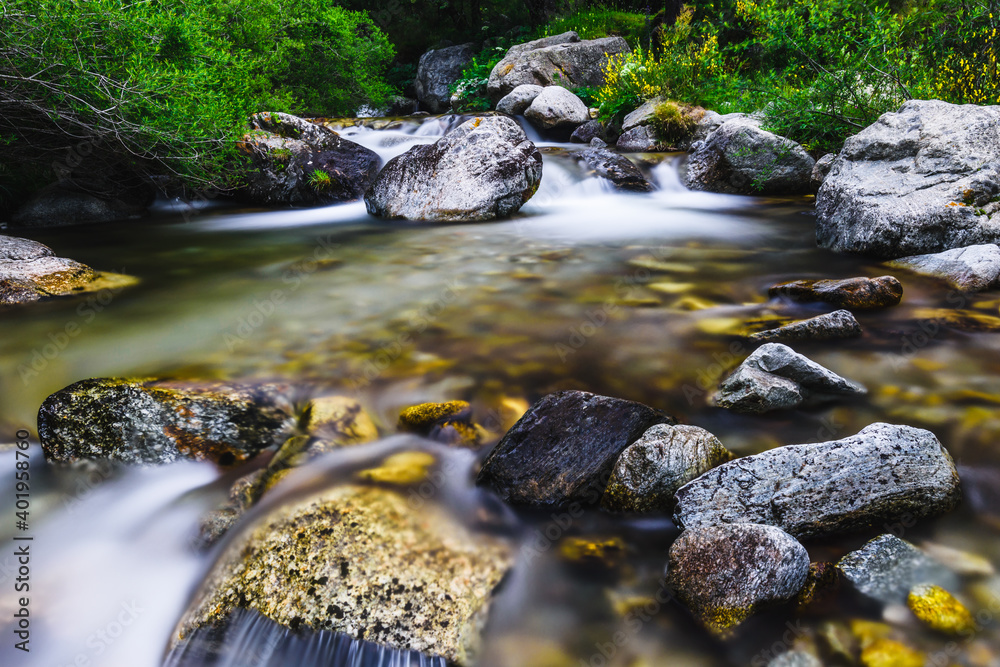 Water flowing over rocks Stock Photo | Adobe Stock