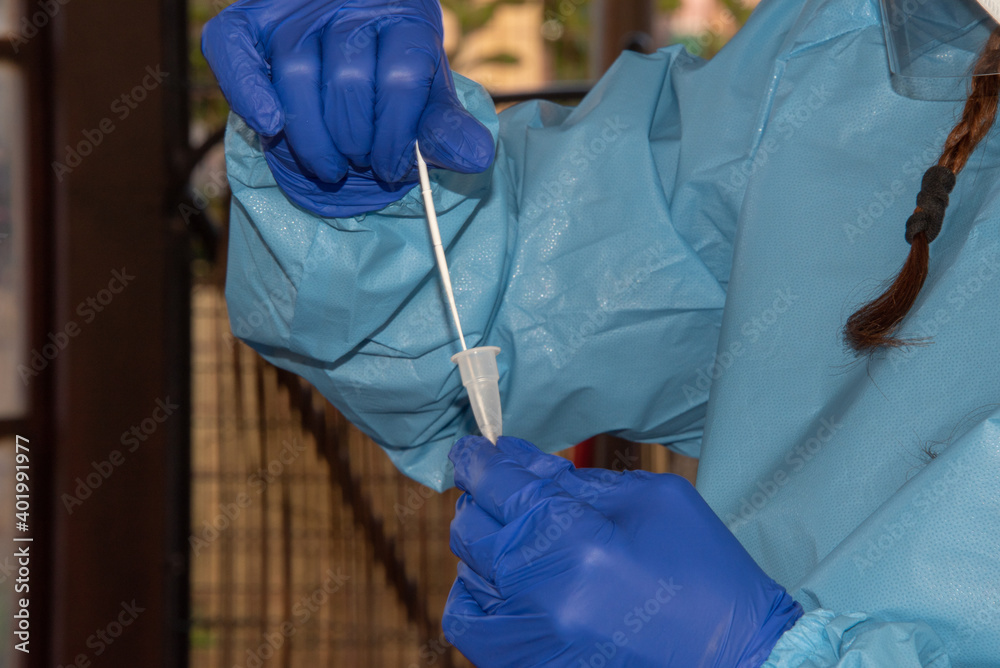 test with covid 19 rapid swab: rod immersed in the reagent Stock Photo ...