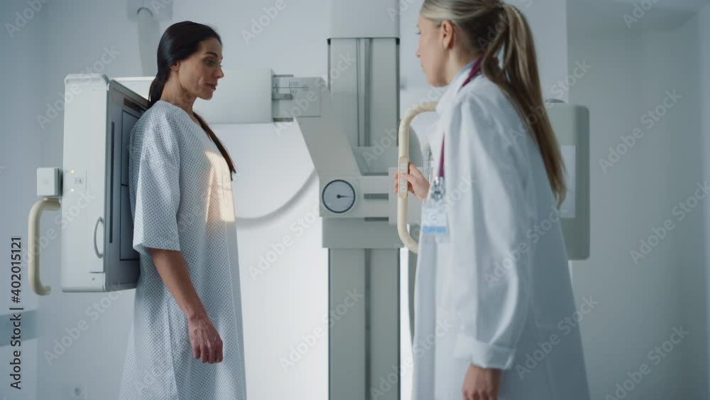 Hospital Radiology Room: Beautiful Multiethnic Woman in Medical Gown ...