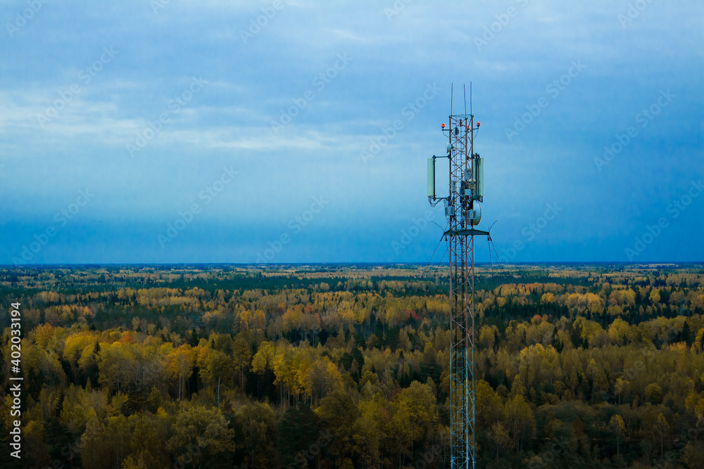 Telecommunication tower with cellular microwave system, sector antennas, transceiver units and ...