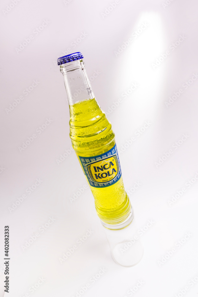 LIMA, PERU - CIRCA 2019: A classic glass bottle of Inca Kola soda drink ...