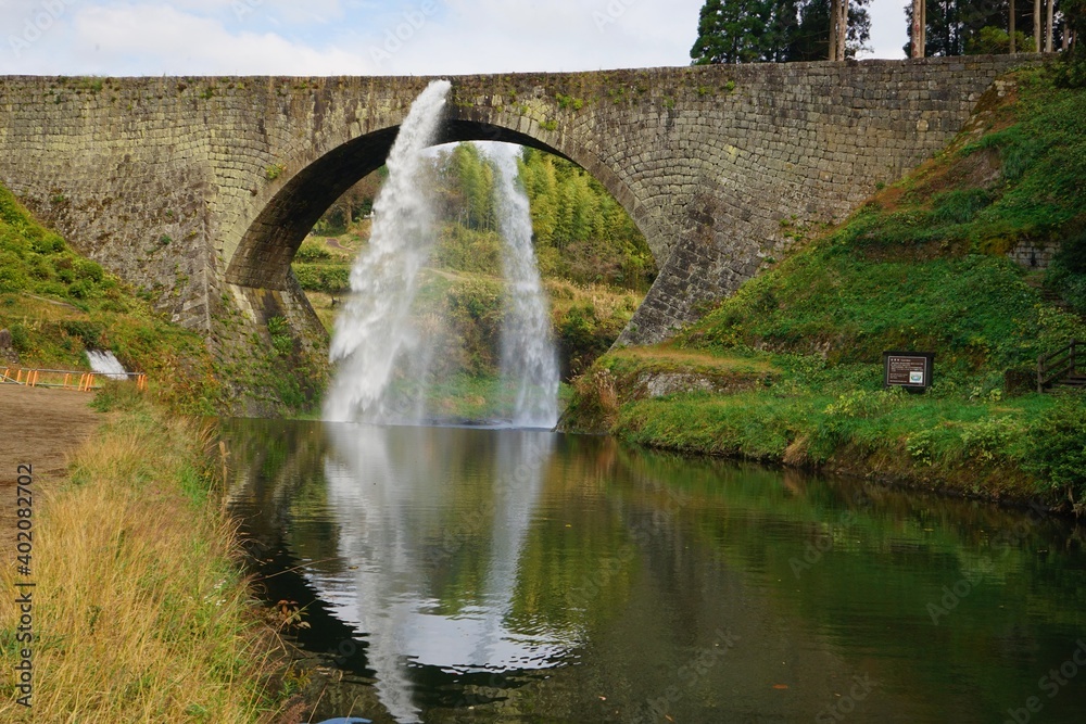 Tsujun Bridge, Traditional Arch Bridge, with flowing water in Kumamoto ...