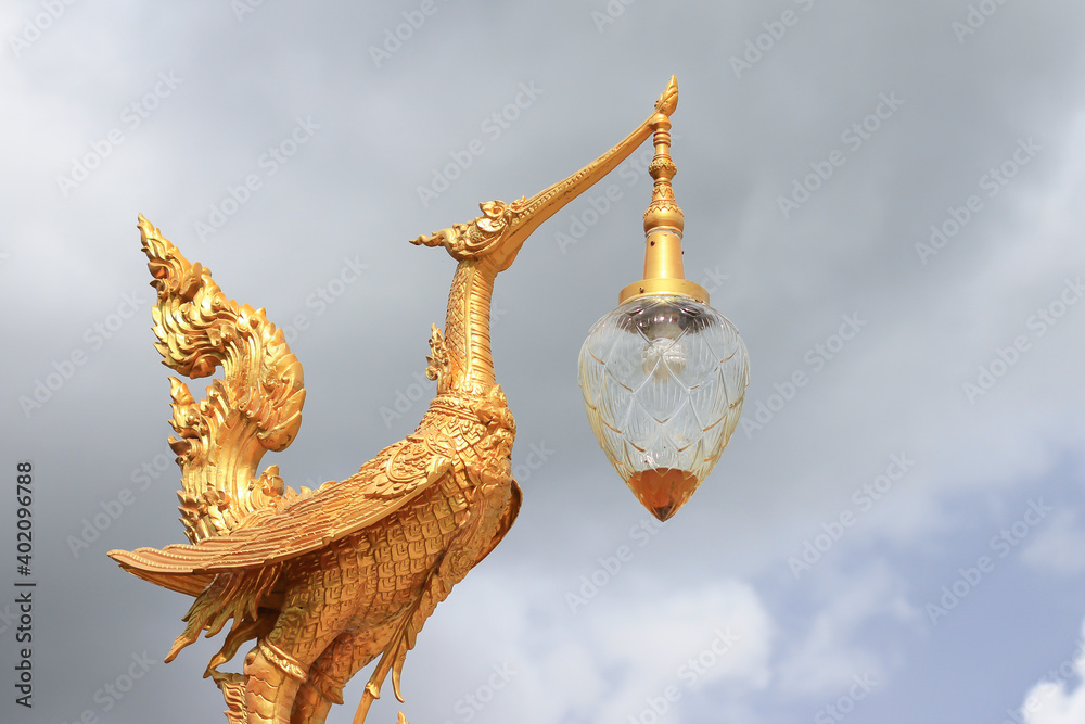 Golden hongsa sculpture in Thailand on cloud background golden swan ...