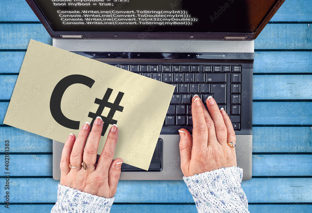 C# programing language . woman hands on laptop and c sharp programing ...