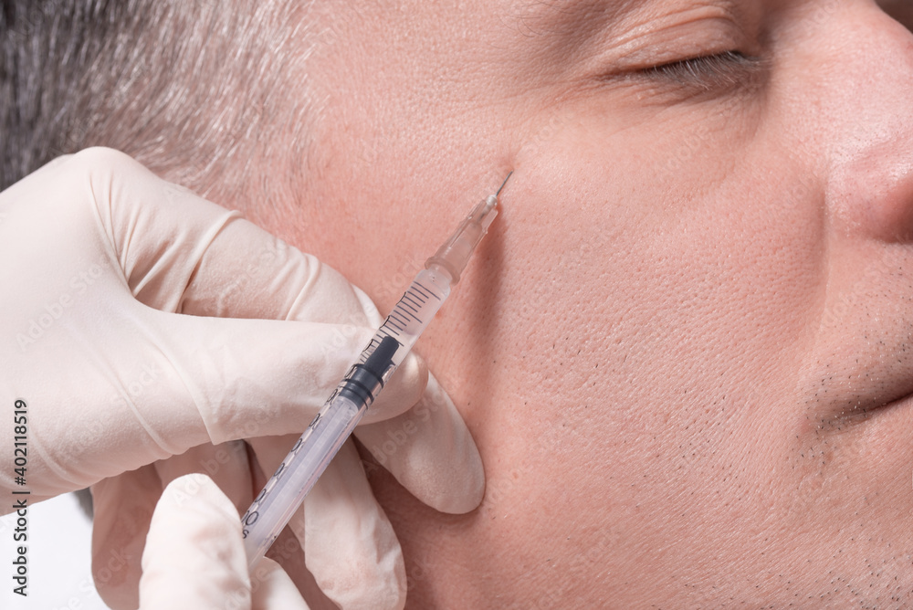 Man beauty procedure anti-wrinkle botox injections Stock Photo | Adobe ...