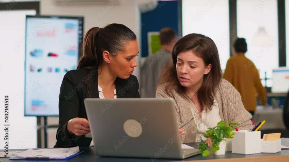 Young project manager and company director talking about business ...