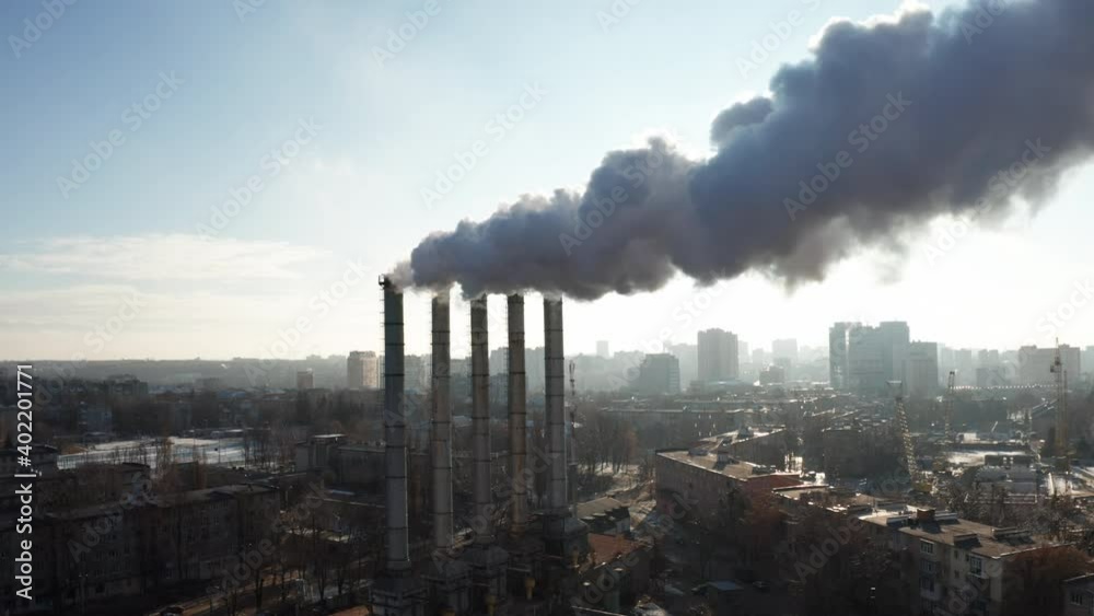 Flying through white clouds of thick smoke from industrial pollution of ...