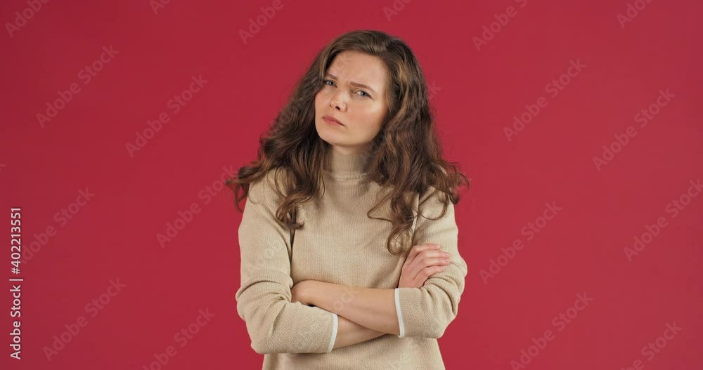 Sad offended woman millennial caucasian girl teenager crosses her arms ...