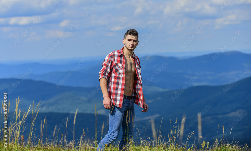 Strong hiker muscular torso. Athlete muscular guy relax mountains ...